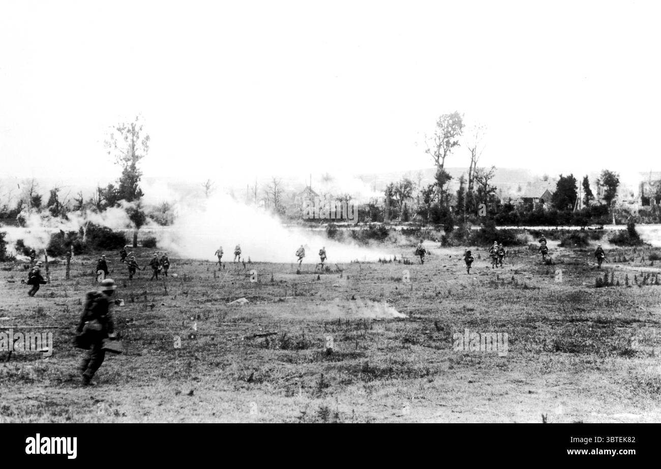 WW1 German infantry advancing in extended order behind a smoke screen ...