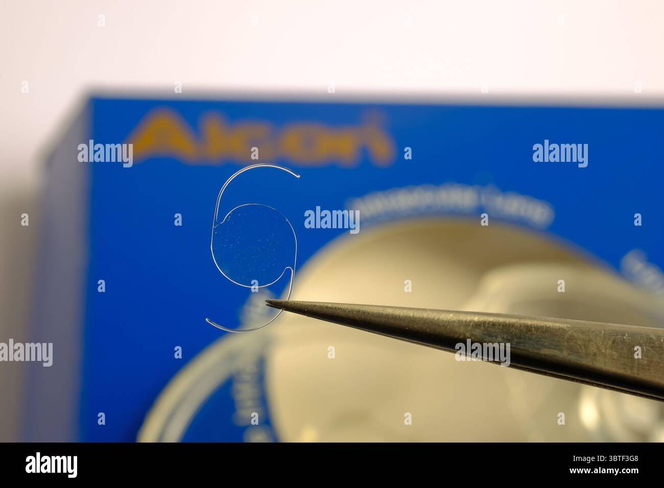 A phaco lens from Alcon, ready for implantation Stock Photo - Alamy