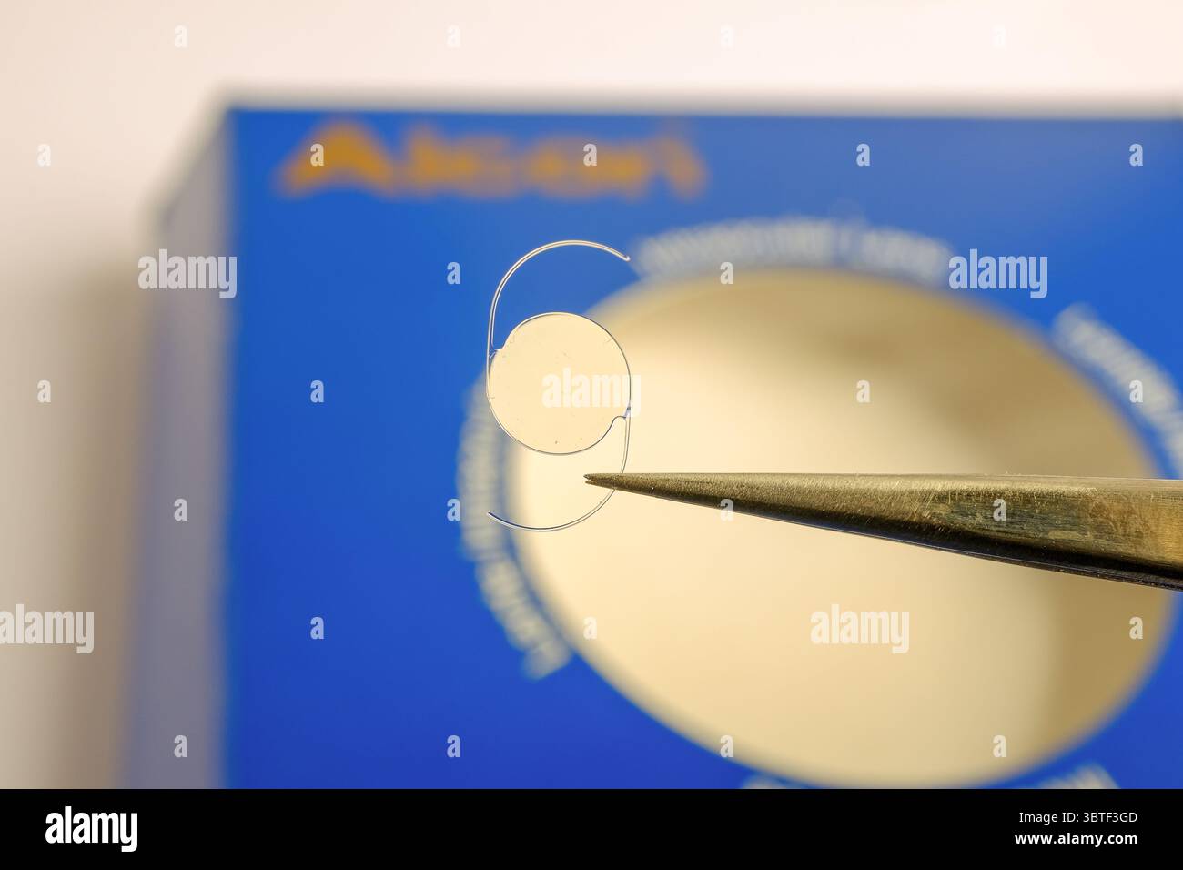 A phaco lens from Alcon, ready for implantation Stock Photo - Alamy
