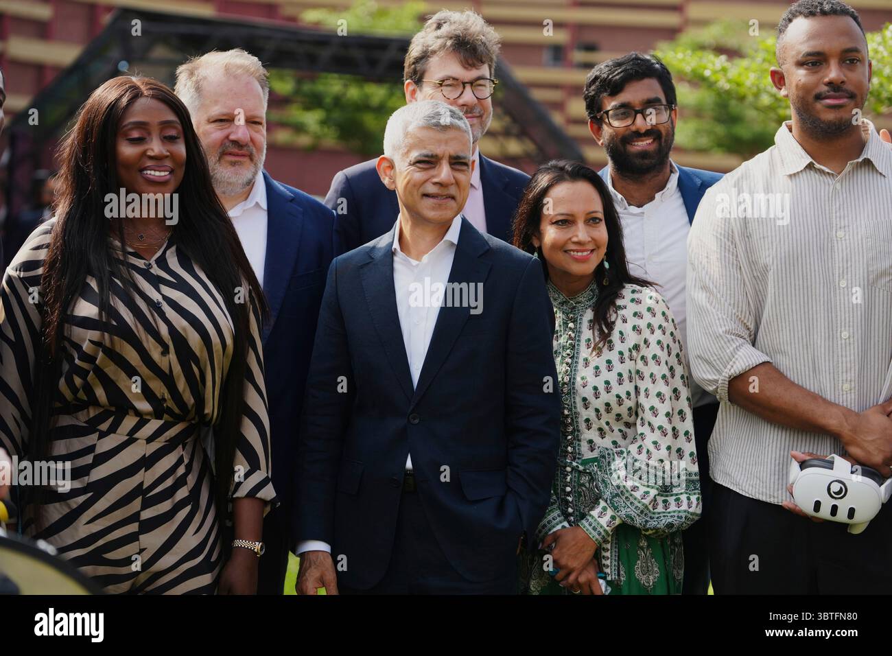 Mayor of London, Sadiq Khan, centre, poses for a photograph before a ...