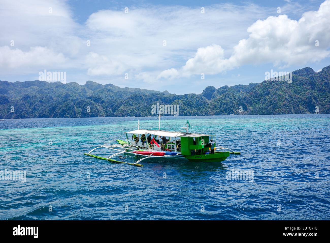 A signature ferry boat transport travelers from Coron islands to scuba ...