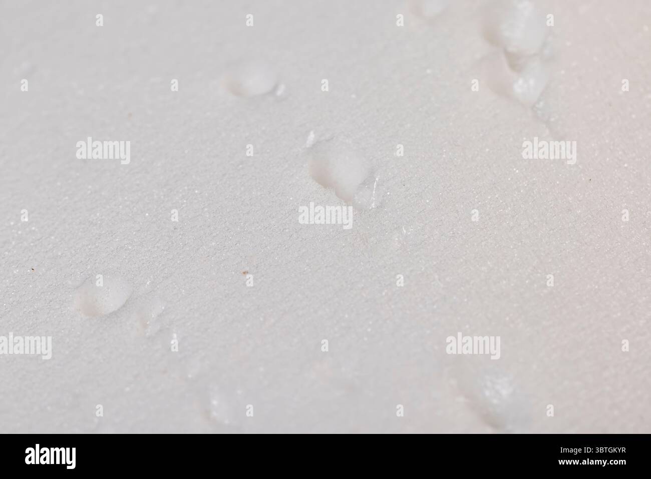 old foam for storing and transporting fragile goods closeup, white foam ...