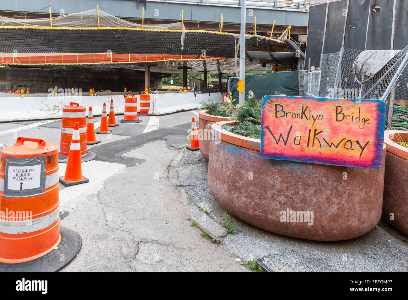 Marked pedestrian access to the Brooklyn Bridge during maintenance work ...