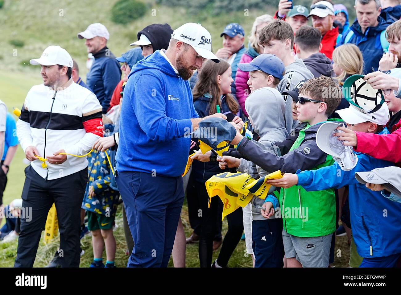 Ireland's Shane Lowry signs autographs on his way to the 9th tee during ...