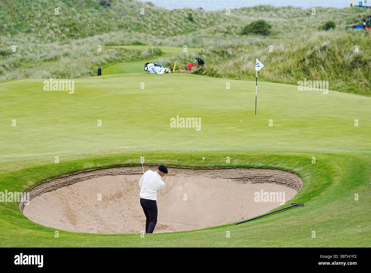 England's Harry Hall clips from the bunker during the third preview day ...