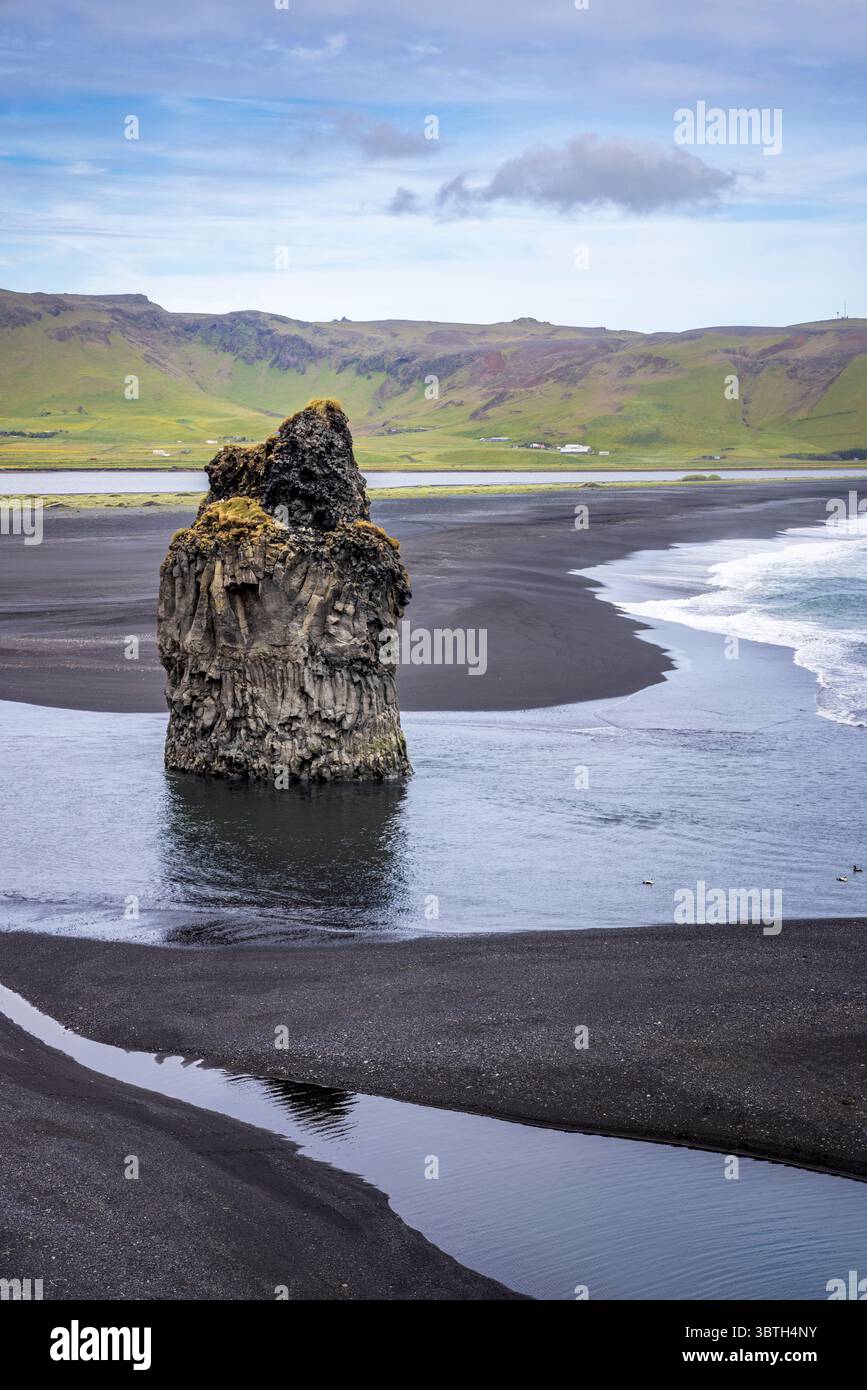 Arnardrangur (Eagle Rock) Basalt rock stack on Kirkjufjara black sand ...