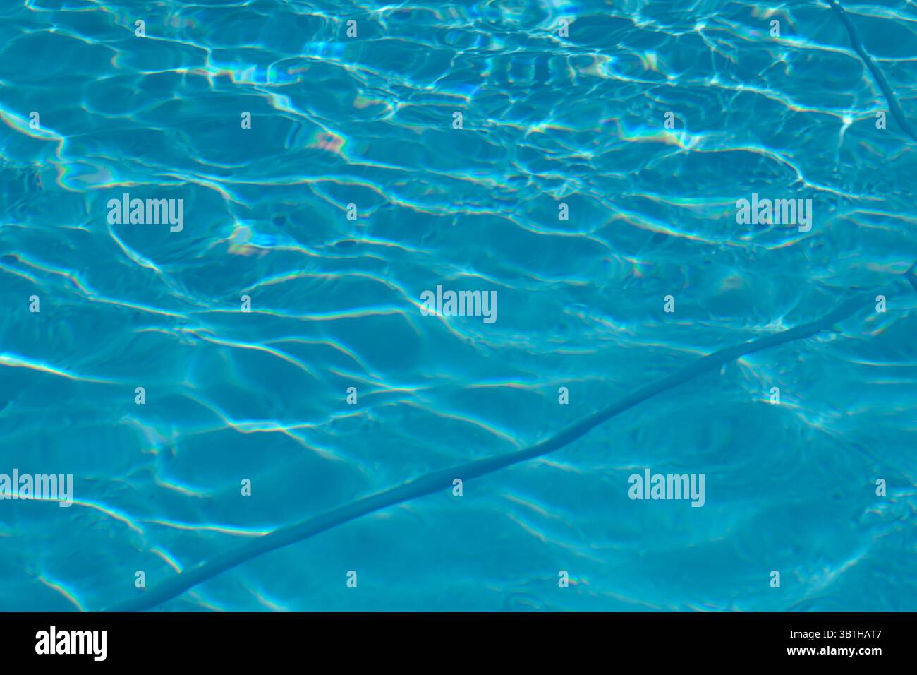 A close-up view of rippling water in a blue pool Stock Photo - Alamy