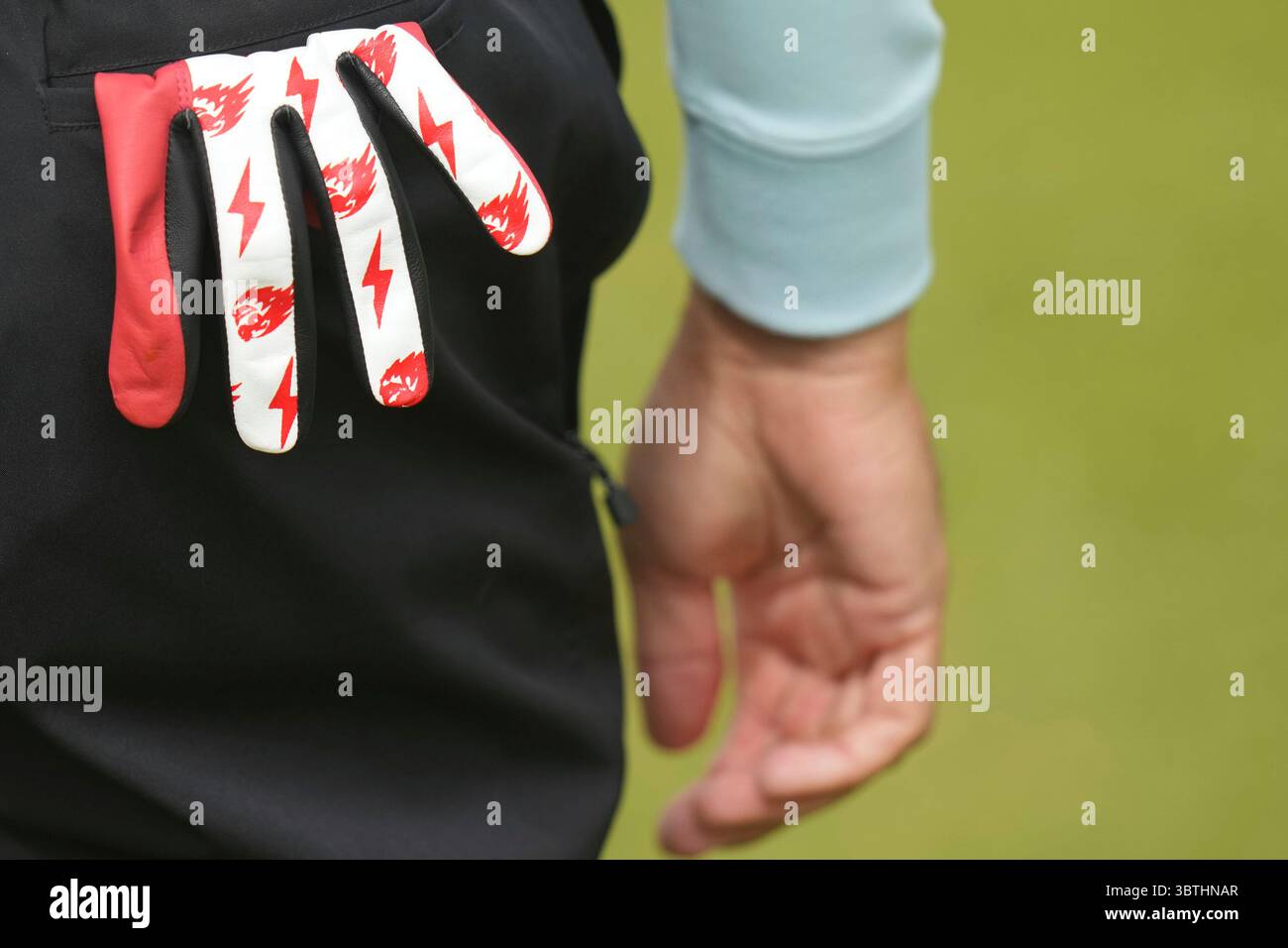 Sergio Garcia of Spain with is colourful driver gloves in his back ...