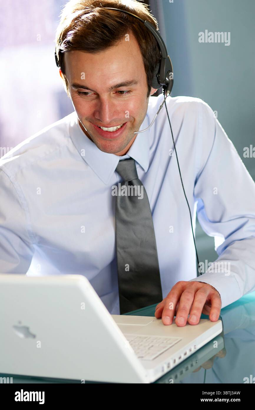 Businessman using laptop telephone hi-res stock photography and images ...