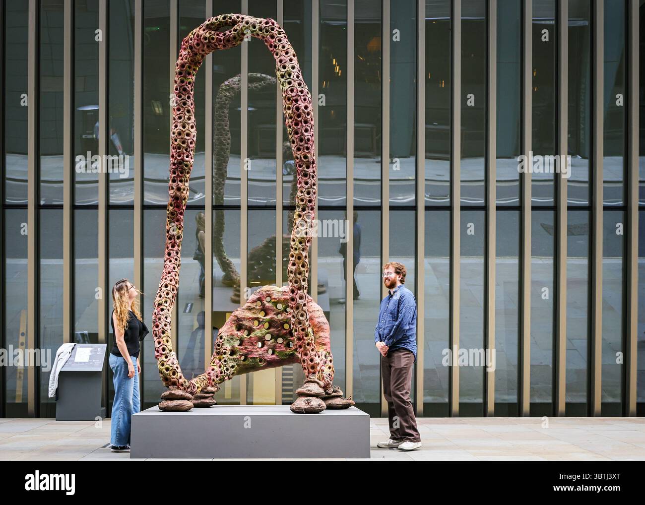 London, UK. 15th July, 2025. Exhibition staff with Andrew Sabin’s ...