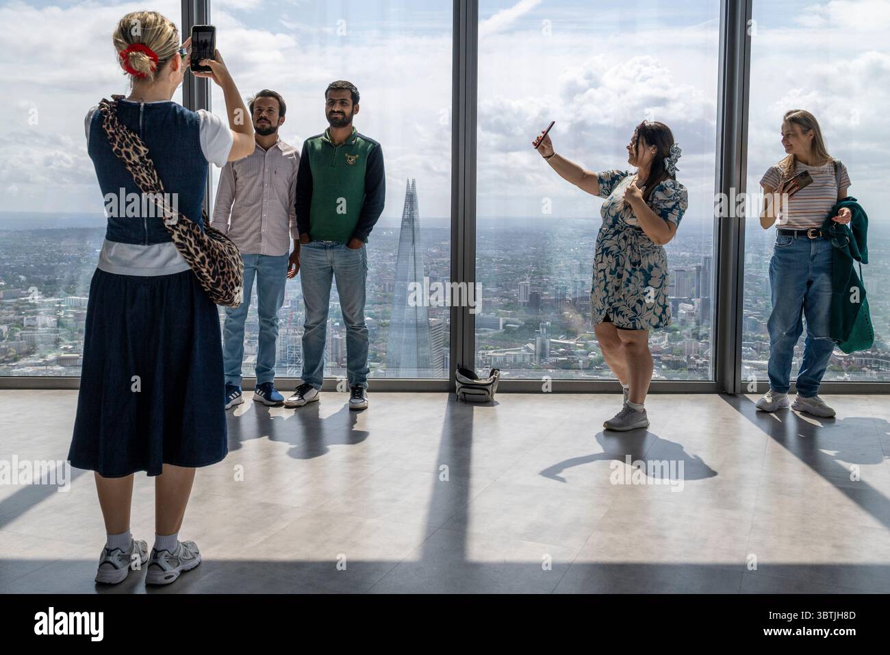 London, UK. 15 July 2025. Visitors take in the impressive view from ...