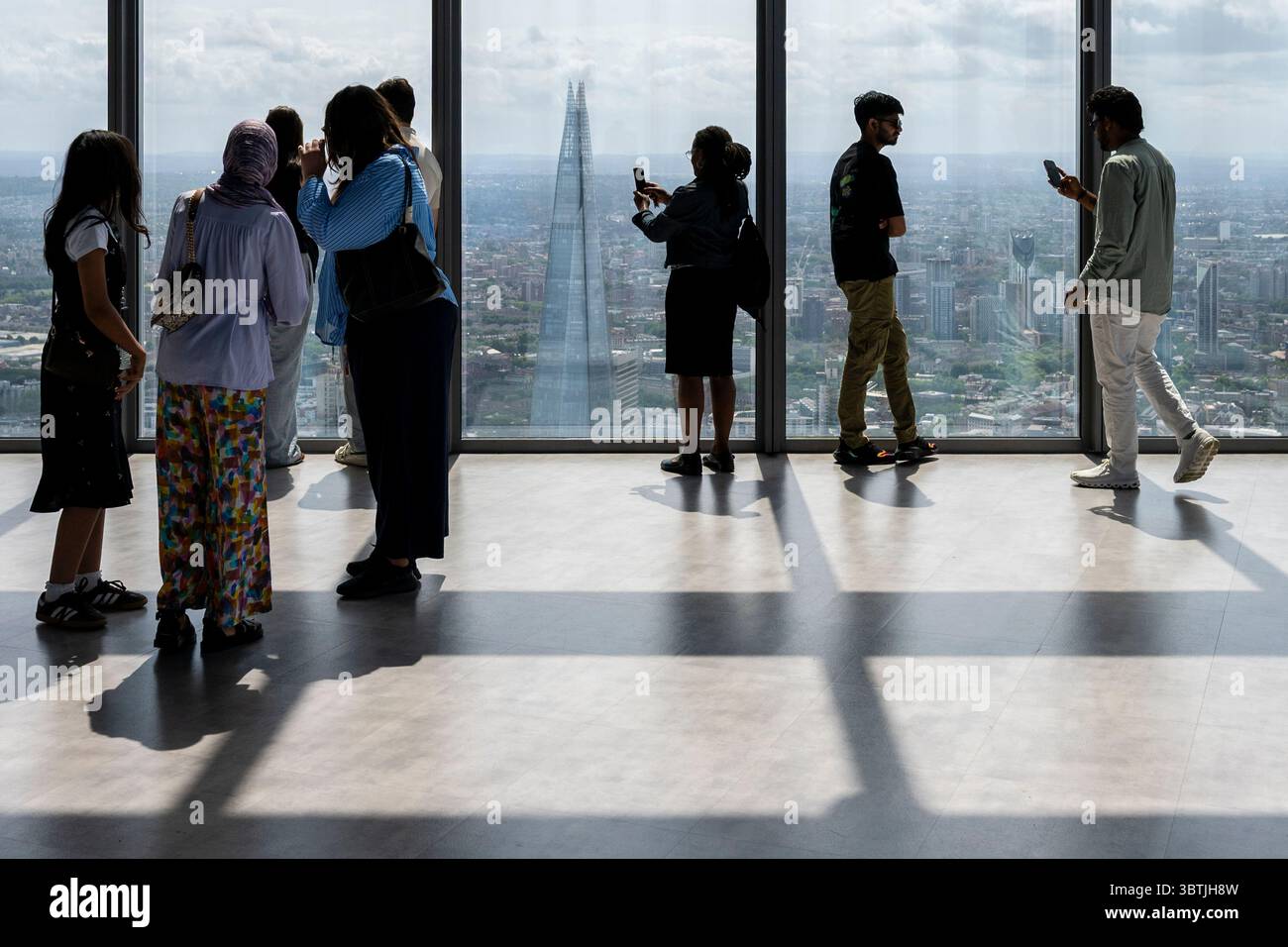 London, UK. 15 July 2025. Visitors take in the impressive view from ...