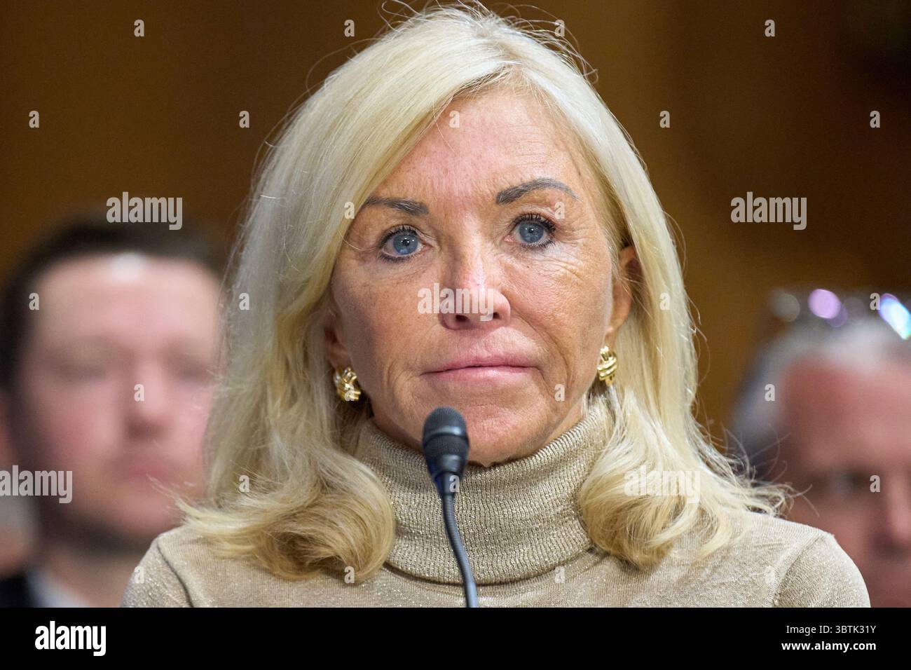 Christine Toretti, left, nominee for U.S. Ambassador to Sweden, attends ...