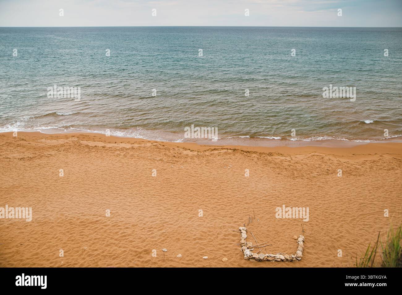 Serene empty beach gentle waves hi-res stock photography and images - Alamy
