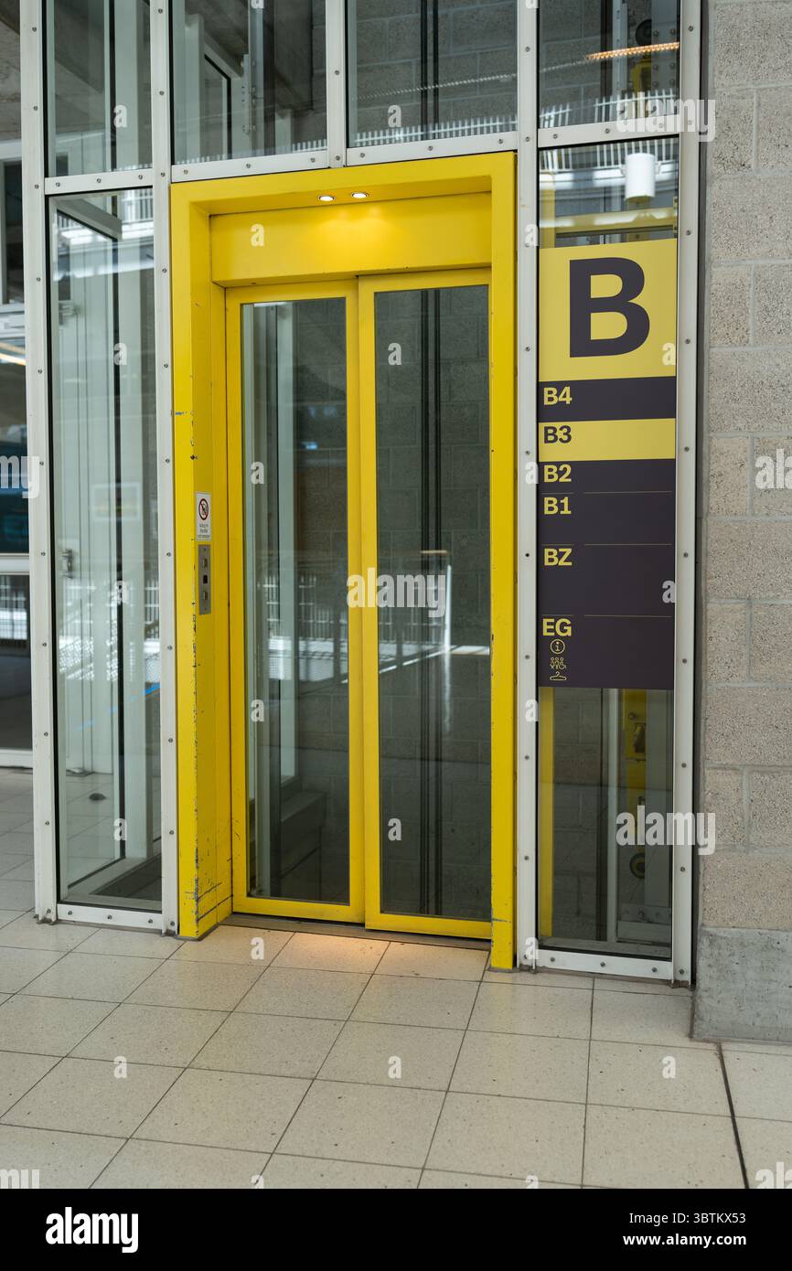 Glass elevator cabin in a public building. Loft style. Sector B Stock ...