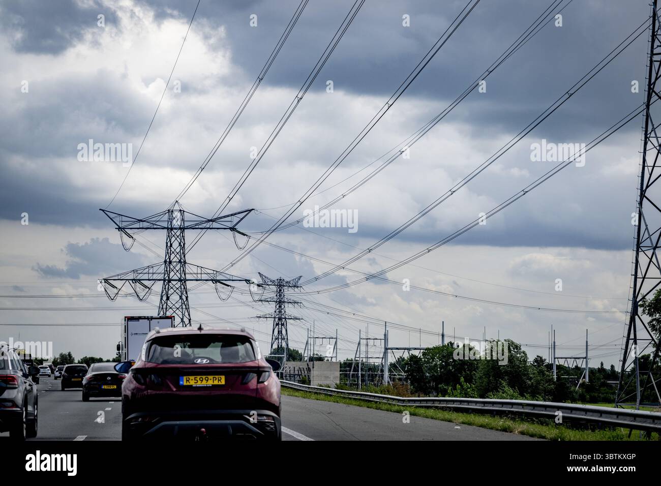 UTRECHT - High-voltage pylons in the landscape. Electric energy is ...