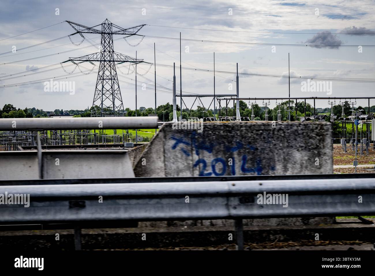 UTRECHT - High-voltage pylons in the landscape. Electric energy is ...