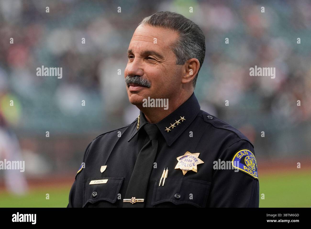San Jose Police Department's Paul Joseph is shown before a baseball ...