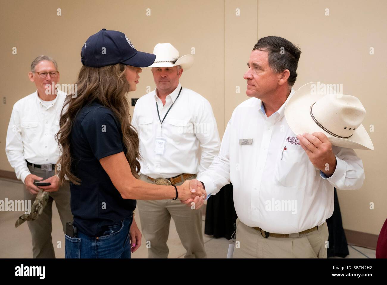 Homeland Security Secretary Kristi Noem receives a briefing from first ...