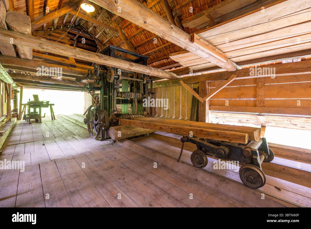Interior of a traditional sawmill showcasing vintage wood processing ...