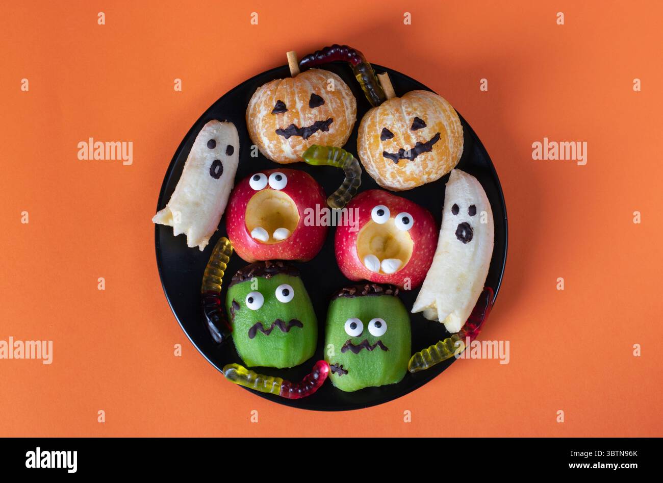 Fruit monsters and ghosts for a Halloween party, Top view Stock Photo ...