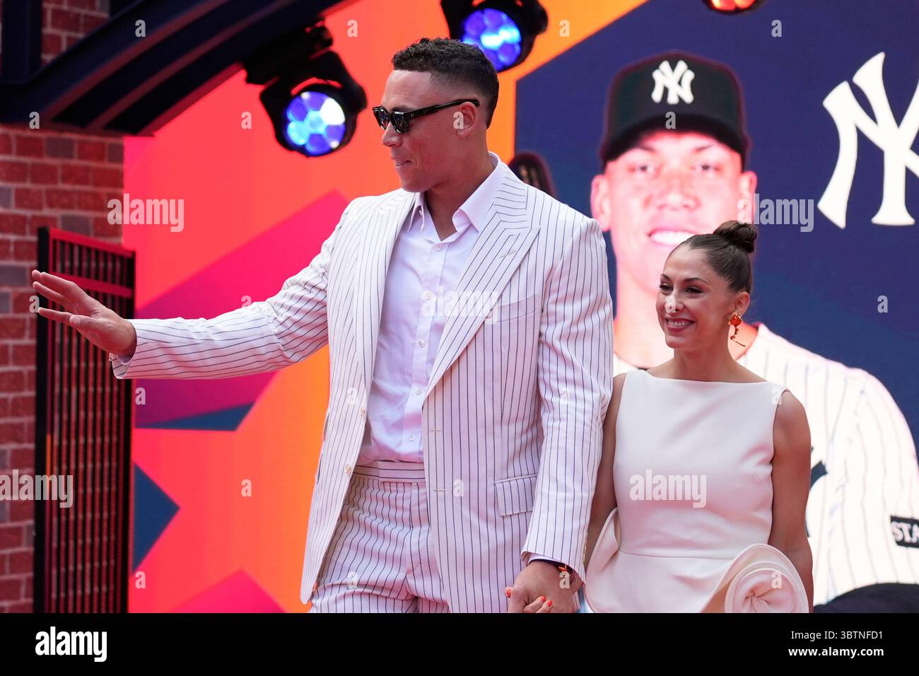New York Yankees' Aaron Judge arrives with his wife Samantha Bracksieck ...