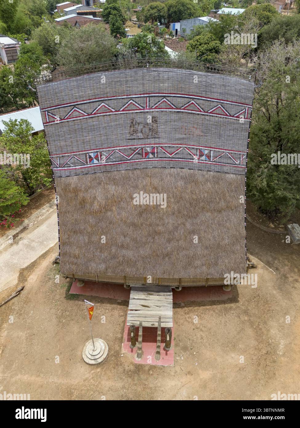 Aerial view of a traditional communal house standing tall with its ...