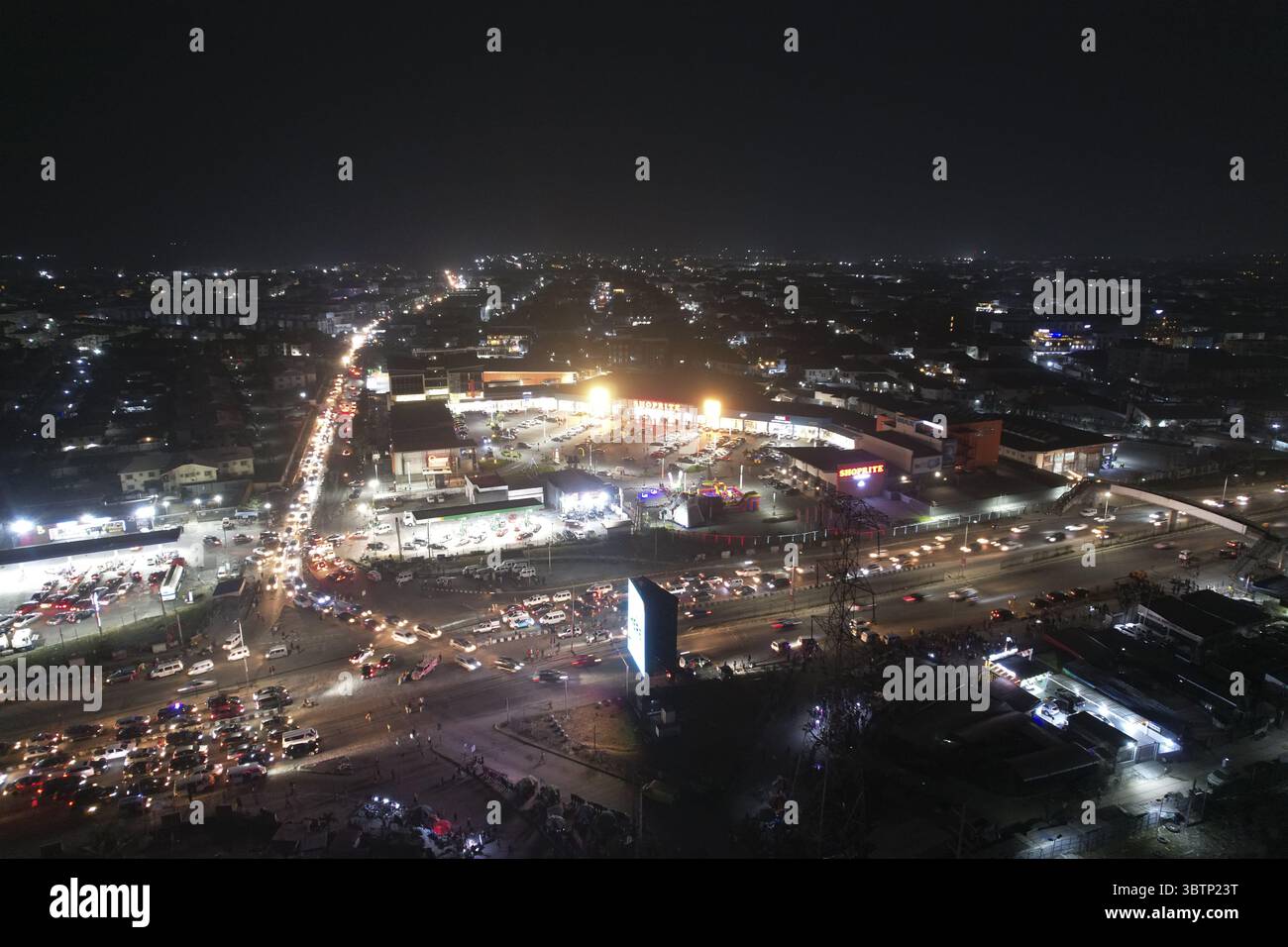 Aerial view of a dazzling cityscape with vibrant lights illuminating ...