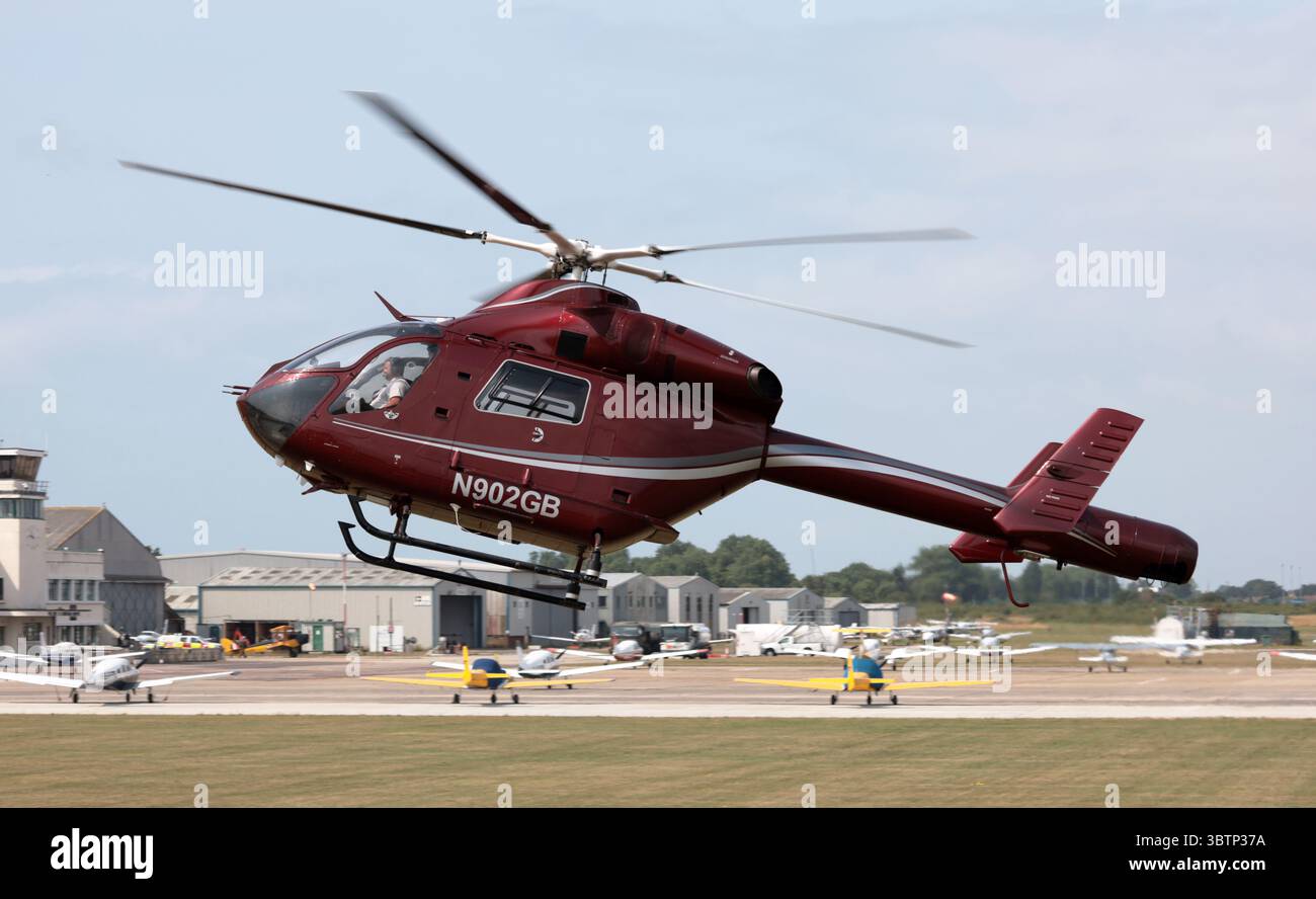 A McDonnell Douglas MD-900 Explorer helicopter arriving at Brighton ...