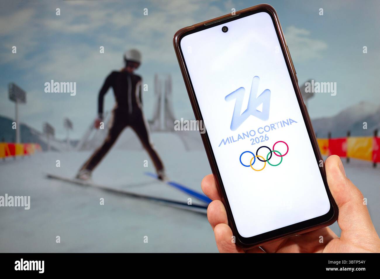 BOGOTA, COLOMBIA - JULY 14 OF 2025 A male hand holding a smartphone ...