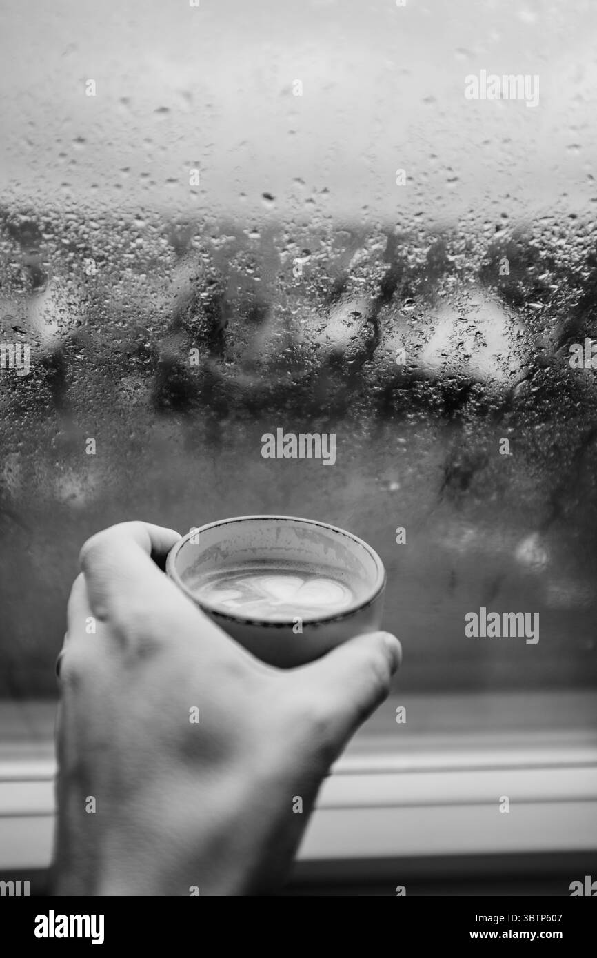 White heart on hand Black and White Stock Photos & Images - Alamy