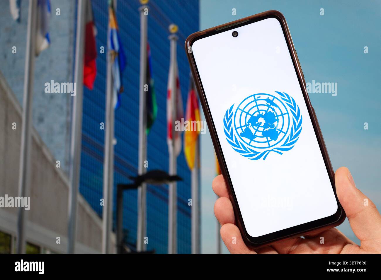 BOGOTA, COLOMBIA - JULY 14 OF 2025 A male hand holding a smartphone ...