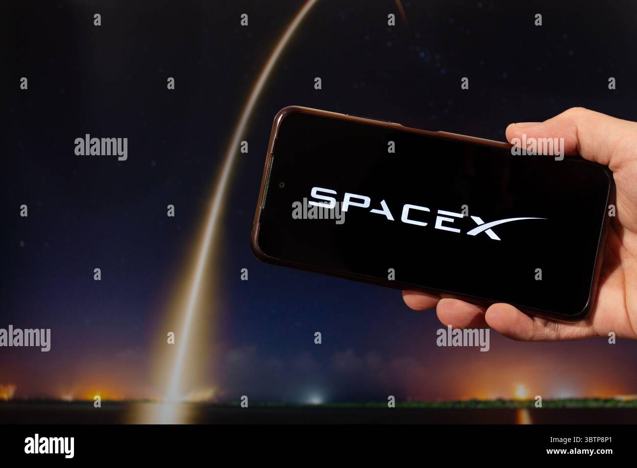 BOGOTA, COLOMBIA - JULY 14 OF 2025 A male hand holding a smartphone ...