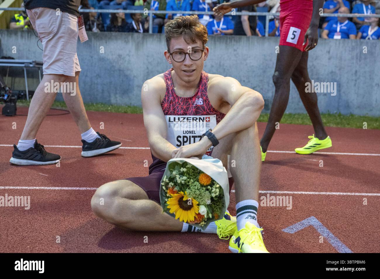 Lionel Spitz from Switzerland reacts after the Men 400m race at the ...