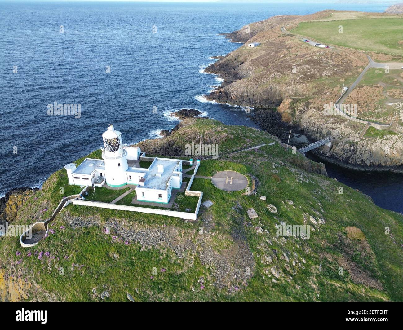 Aerial view of Strumble Head lighthouse on the Pembrokeshire coast ...