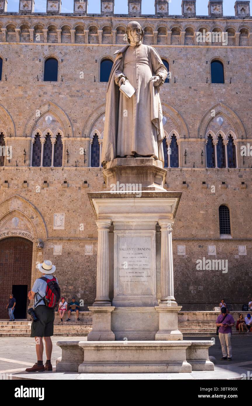 Statue of Sallustio Bandini in the Piazza Salimbeni square, a clergyman ...