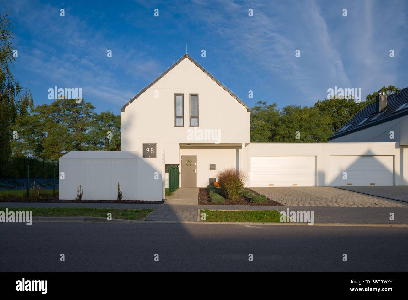 Exterior of a modern single-family house with a minimalist white facade ...