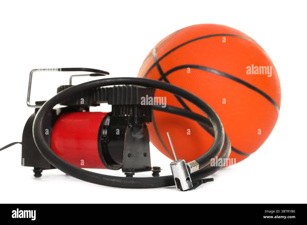 Basketball ball and air compressor isolated on white Stock Photo - Alamy