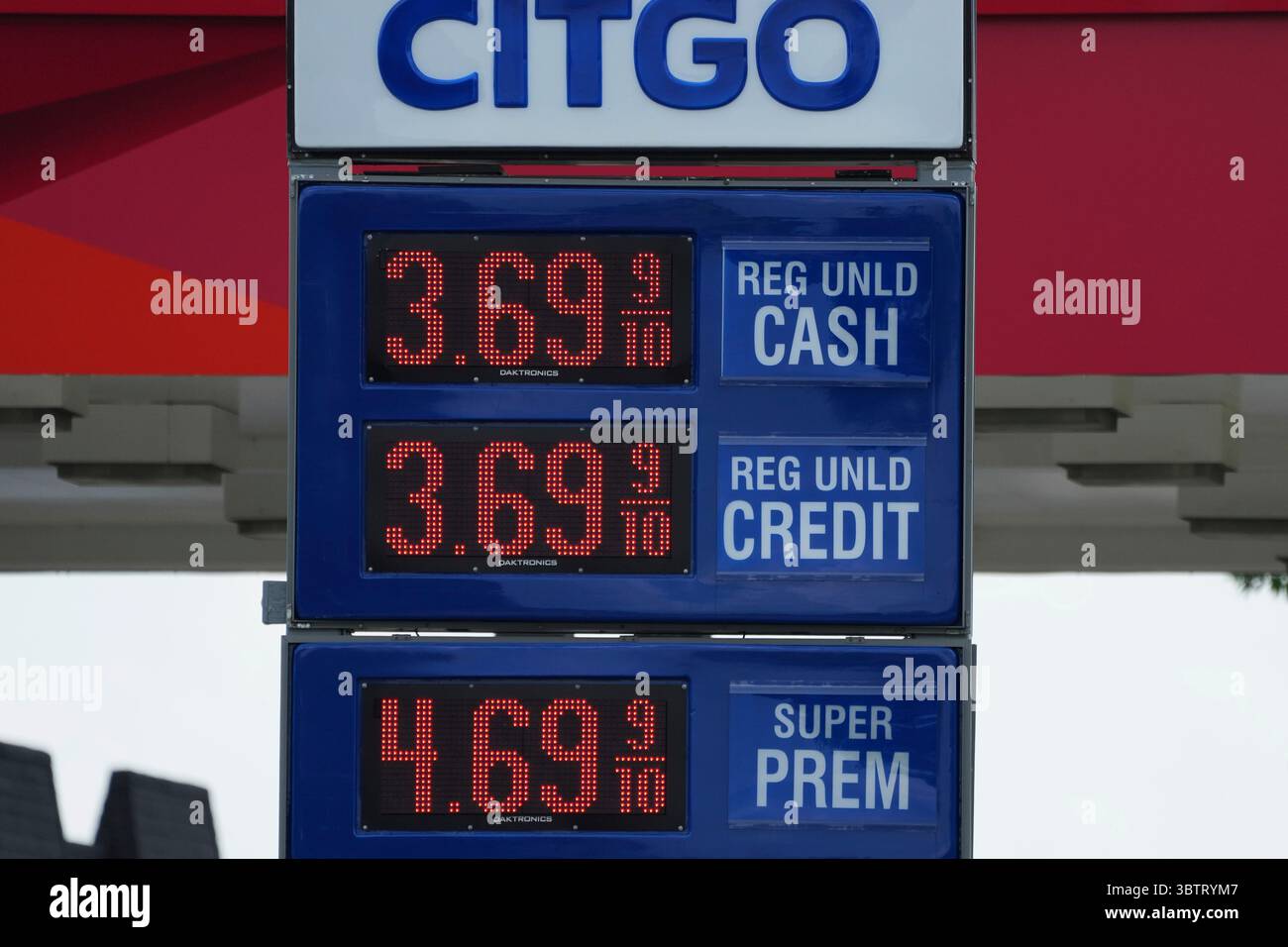Gas prices (Cash and Credit Card) are displayed at a gas station in ...
