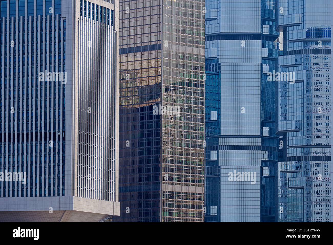 Tall buildings with glass facades outside on Hong Kong streets Stock ...