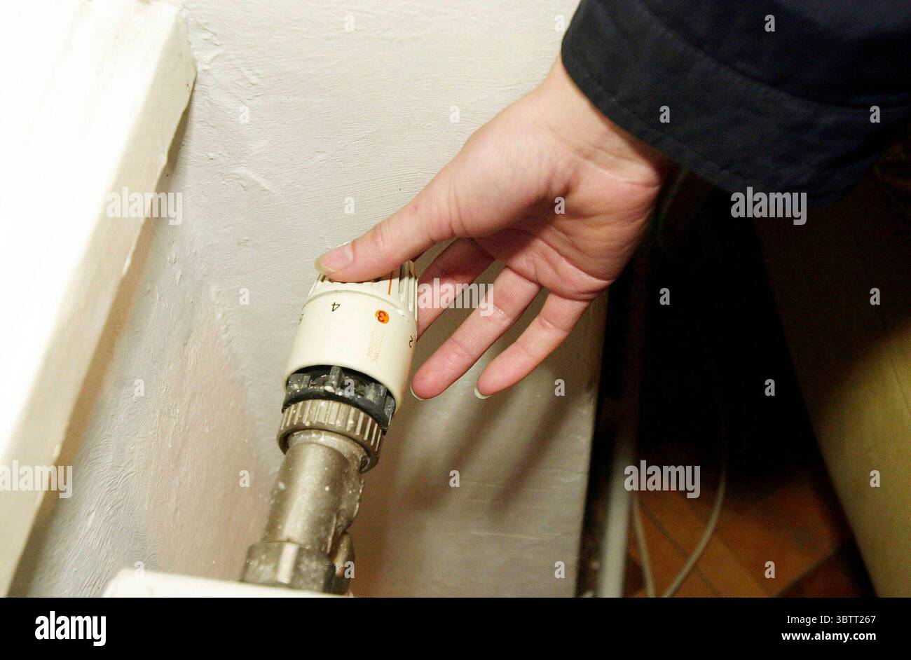 regulating the temperature of a convection heater inside a building ...