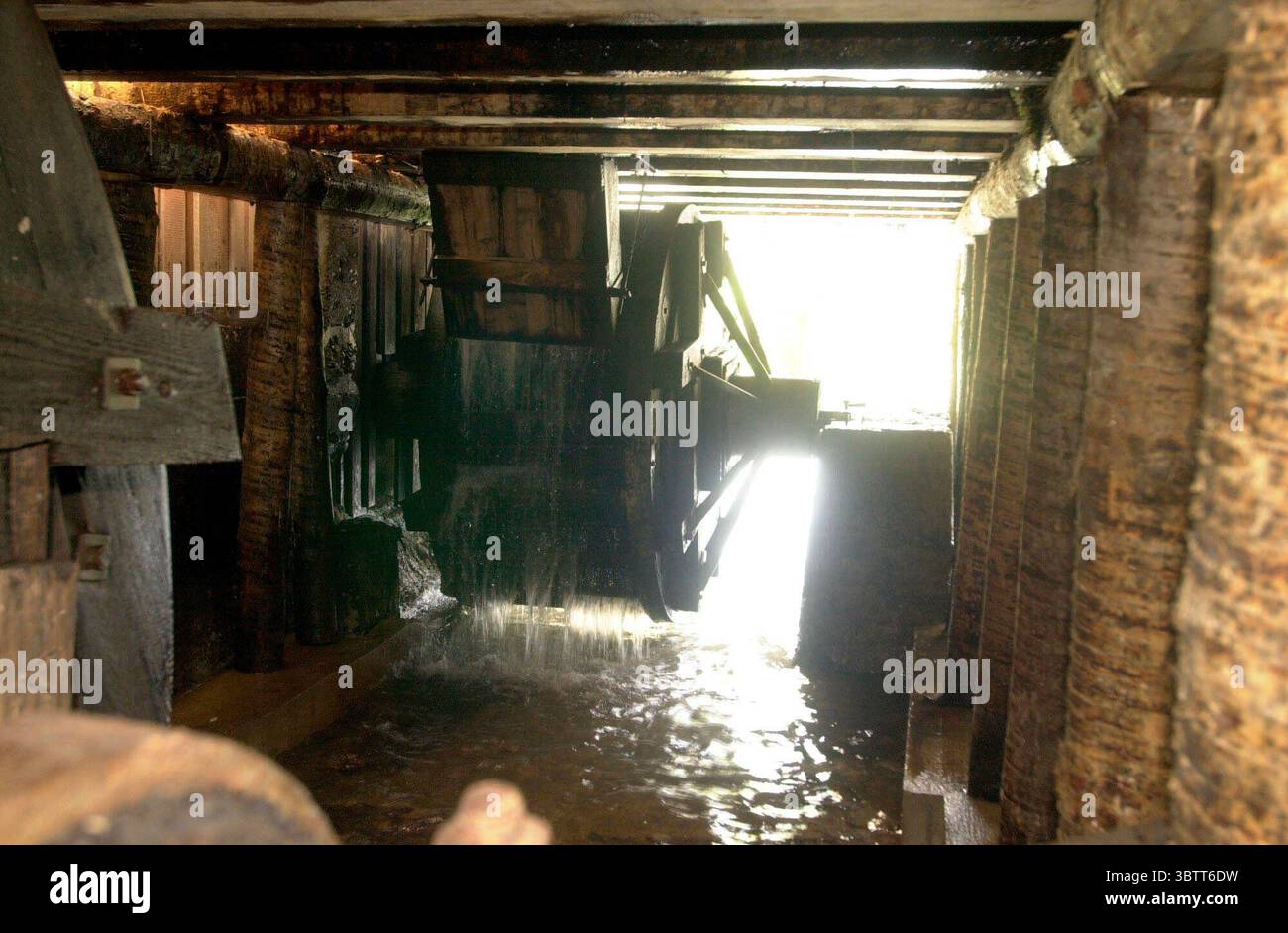a water wheel rotating in a wood mill for power generation Water wheel ...