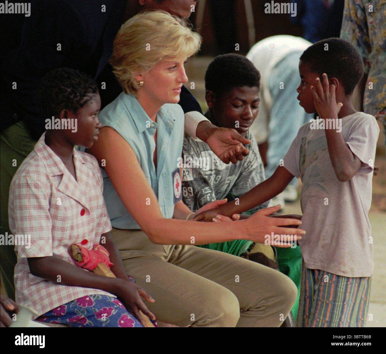 FILE - Diana, Princess of Wales, talks to young Angolan amputees who ...