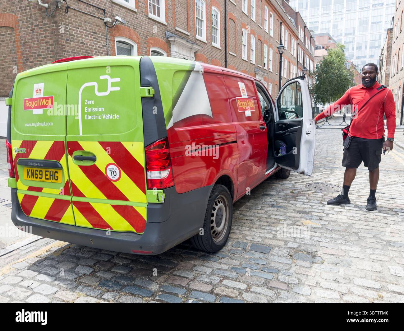 Rear View of Royal Mail Zero-Emission Electric Van as Happy Delivery ...