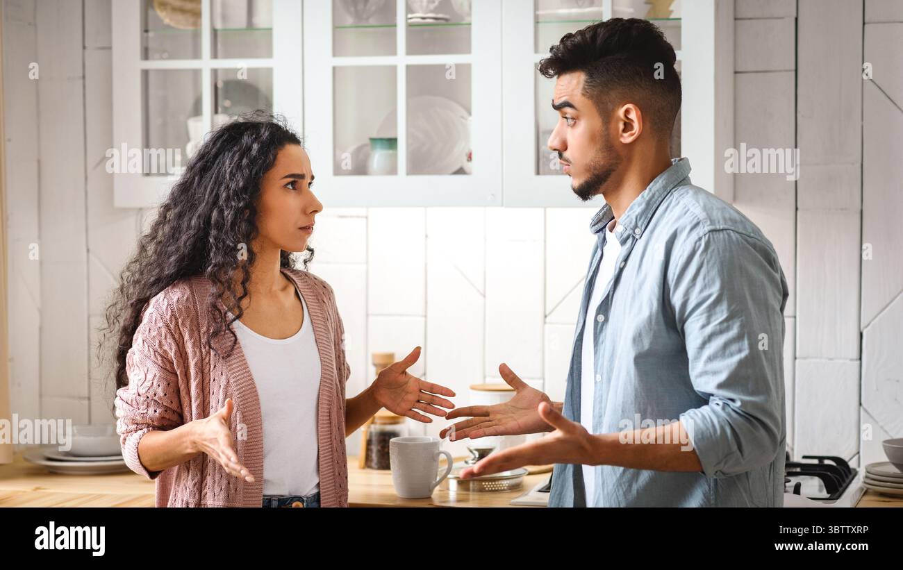 Relationship Crisis. Young Arab Couple Arguing In Kitchen Stock Photo ...