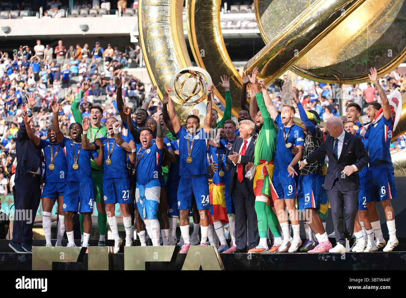 Chelsea's Reece James (24) lifts the trophy as President Donald Trump ...