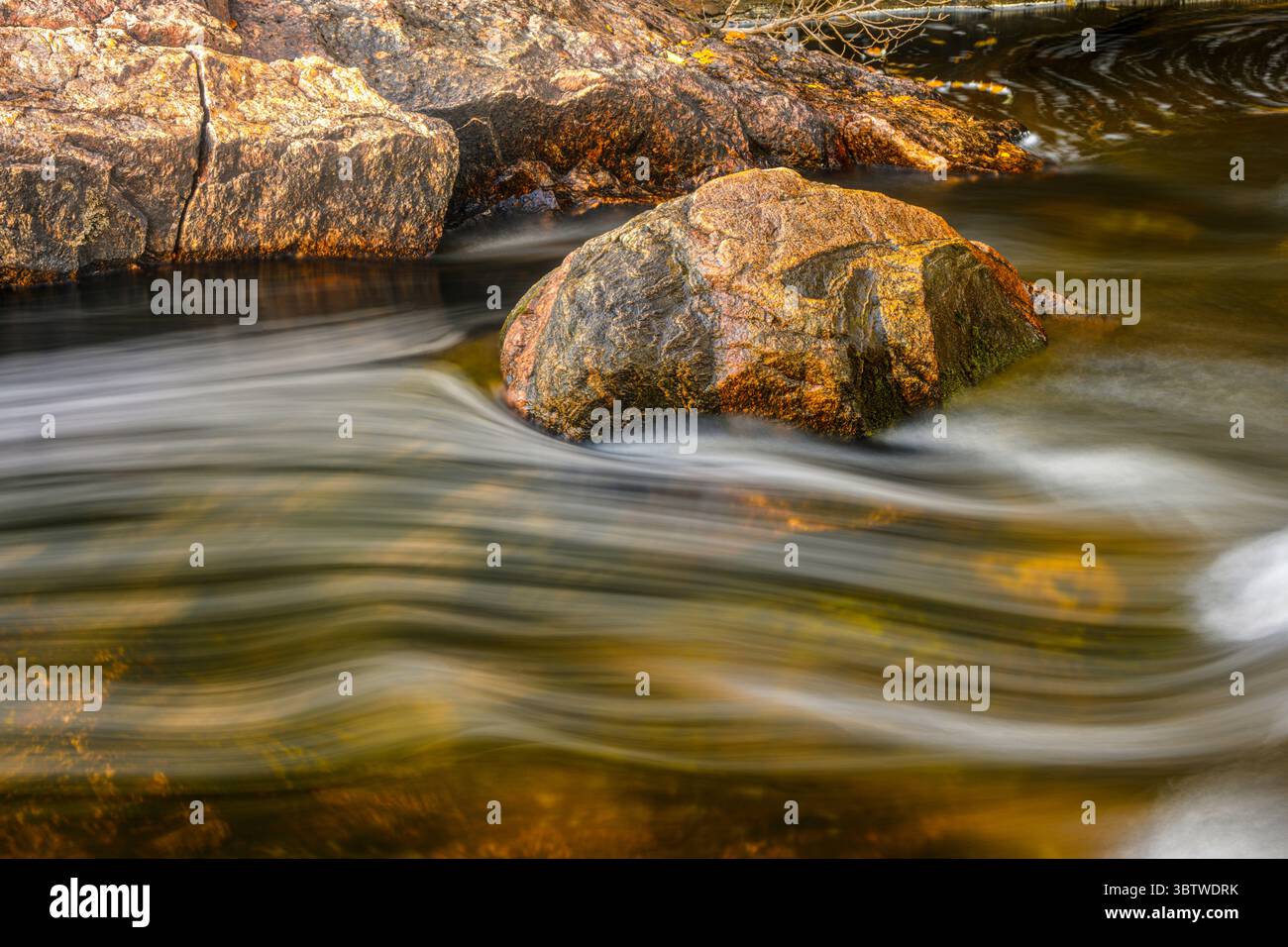 Sand River- rocks, foam eddies, flowing water and rock pools, Lake ...