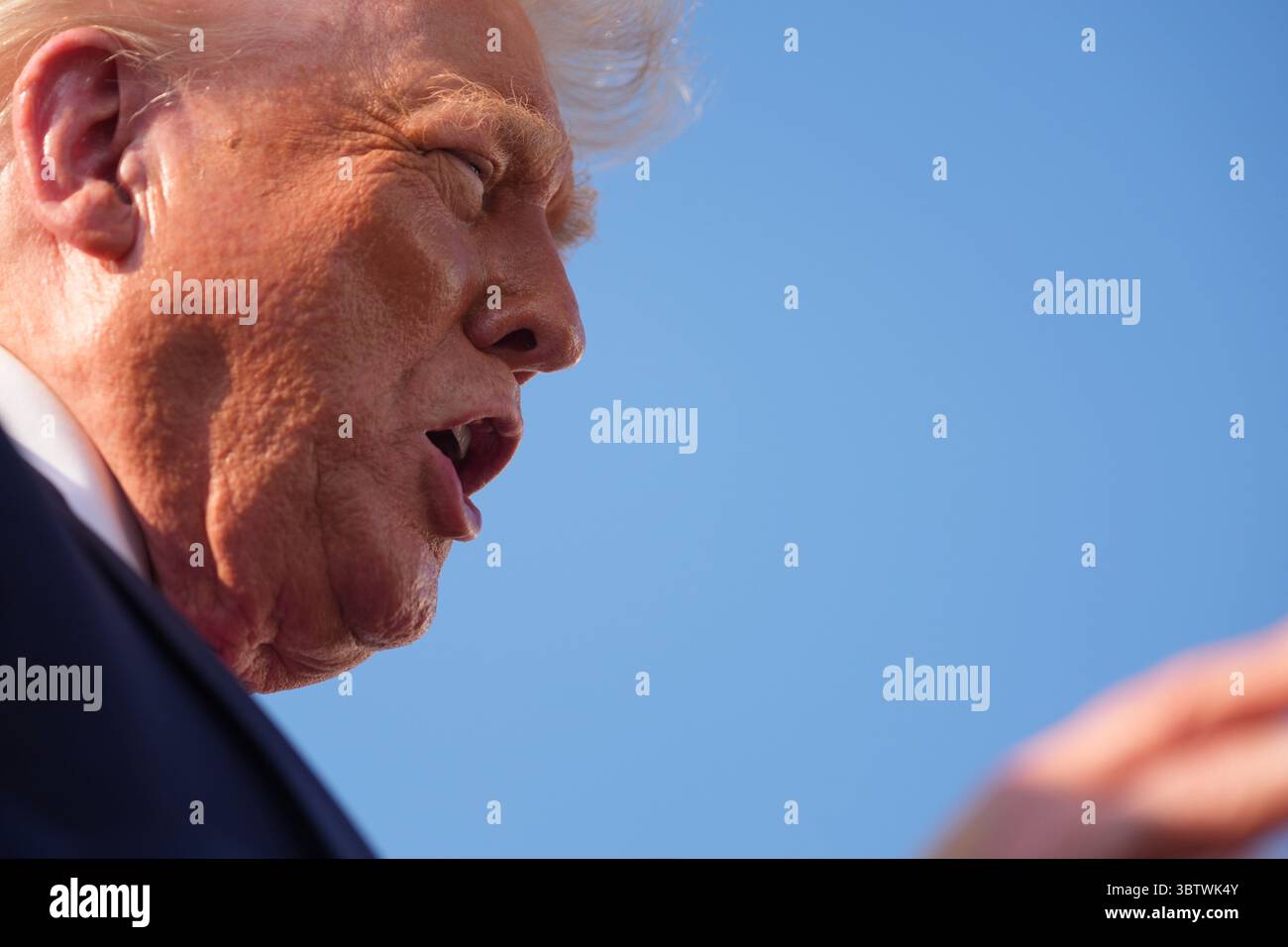 President Donald Trump speaks to the media after arriving at Joint Base ...