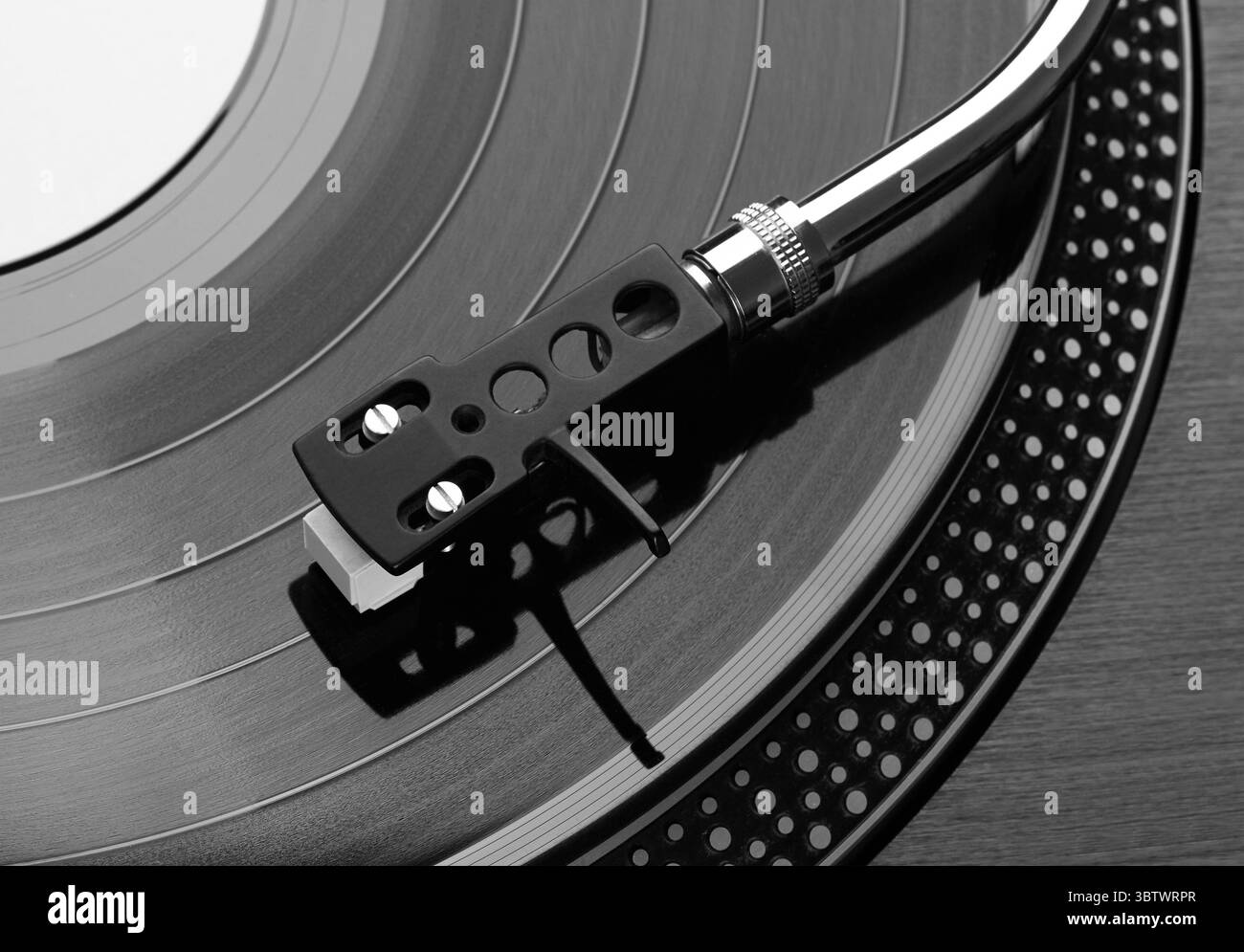 Dj turntable playing vinyl Black and White Stock Photos & Images - Alamy