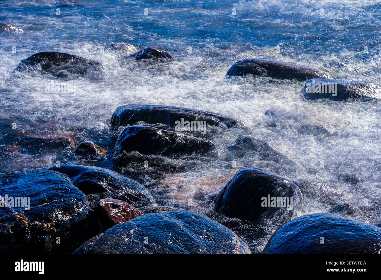 Beach stones and incoming surf at Gargantua, Lake Superior Provincial ...